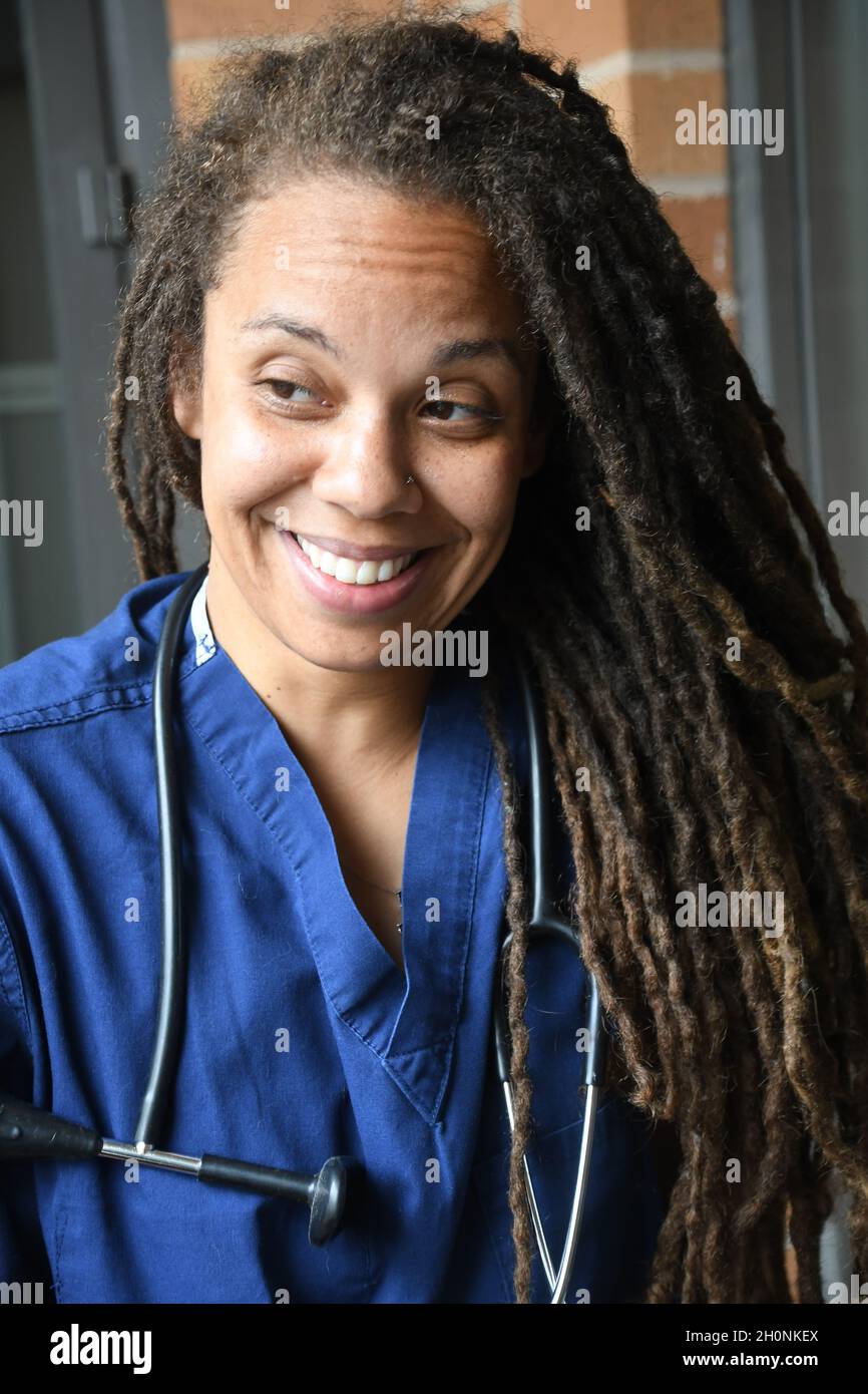 Female doctor with long dreads Stock Photo - Alamy