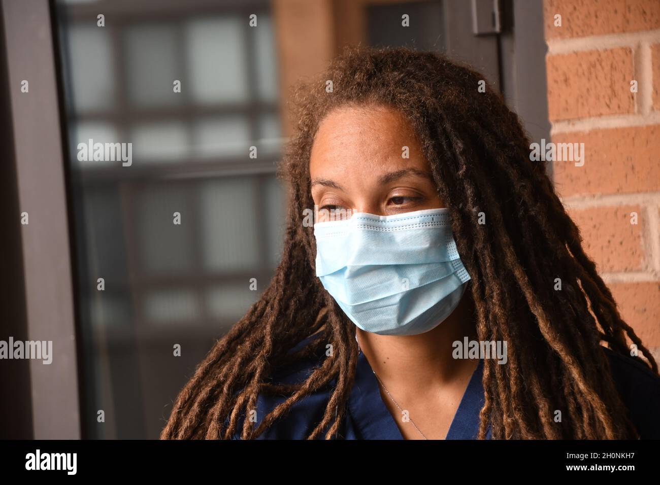 Female doctor with long dreads Stock Photo - Alamy