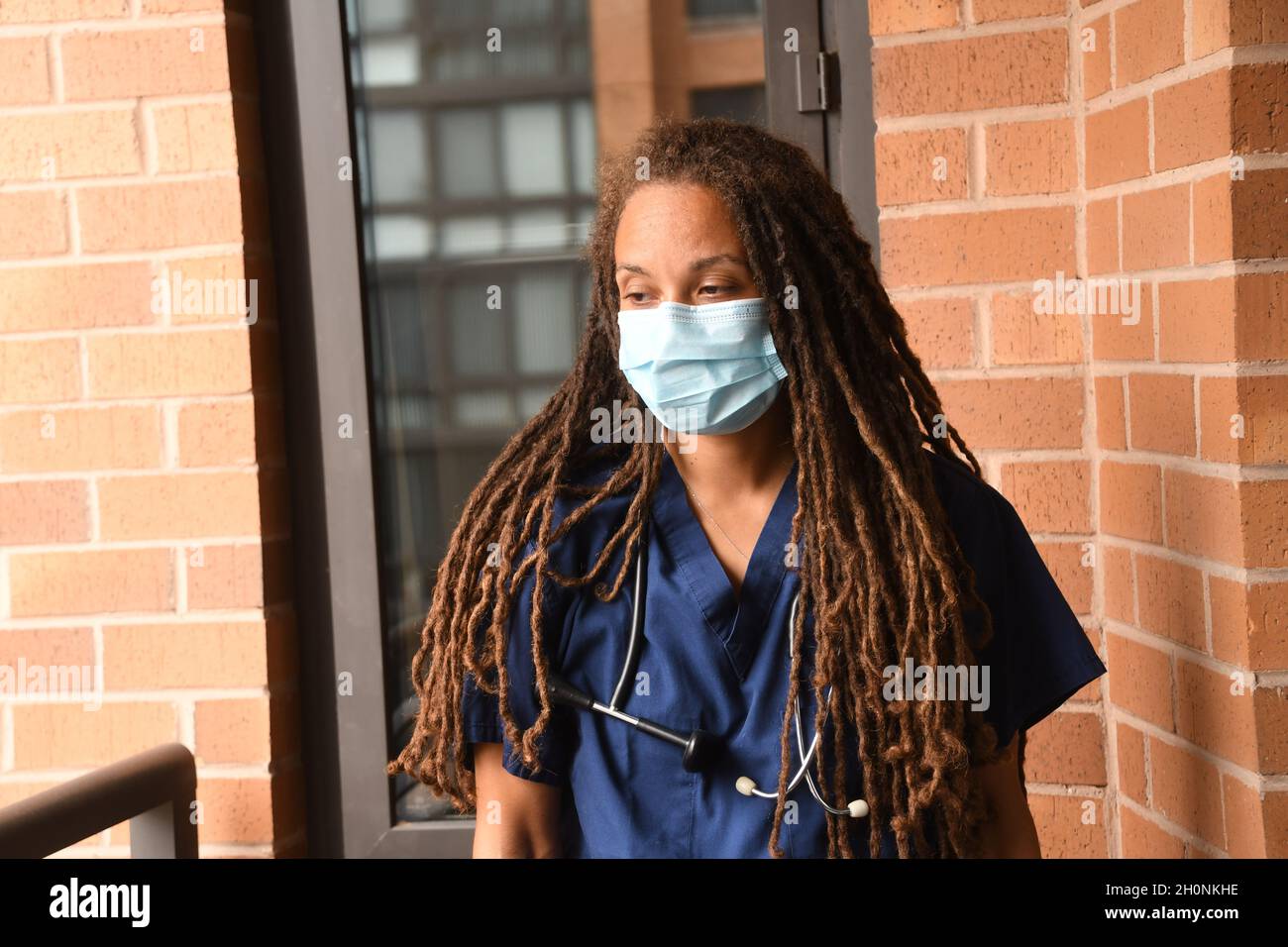 Female doctor with long dreads Stock Photo - Alamy