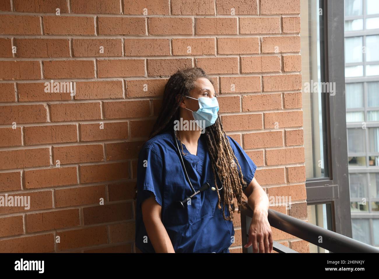 Female doctor with long dreads Stock Photo - Alamy
