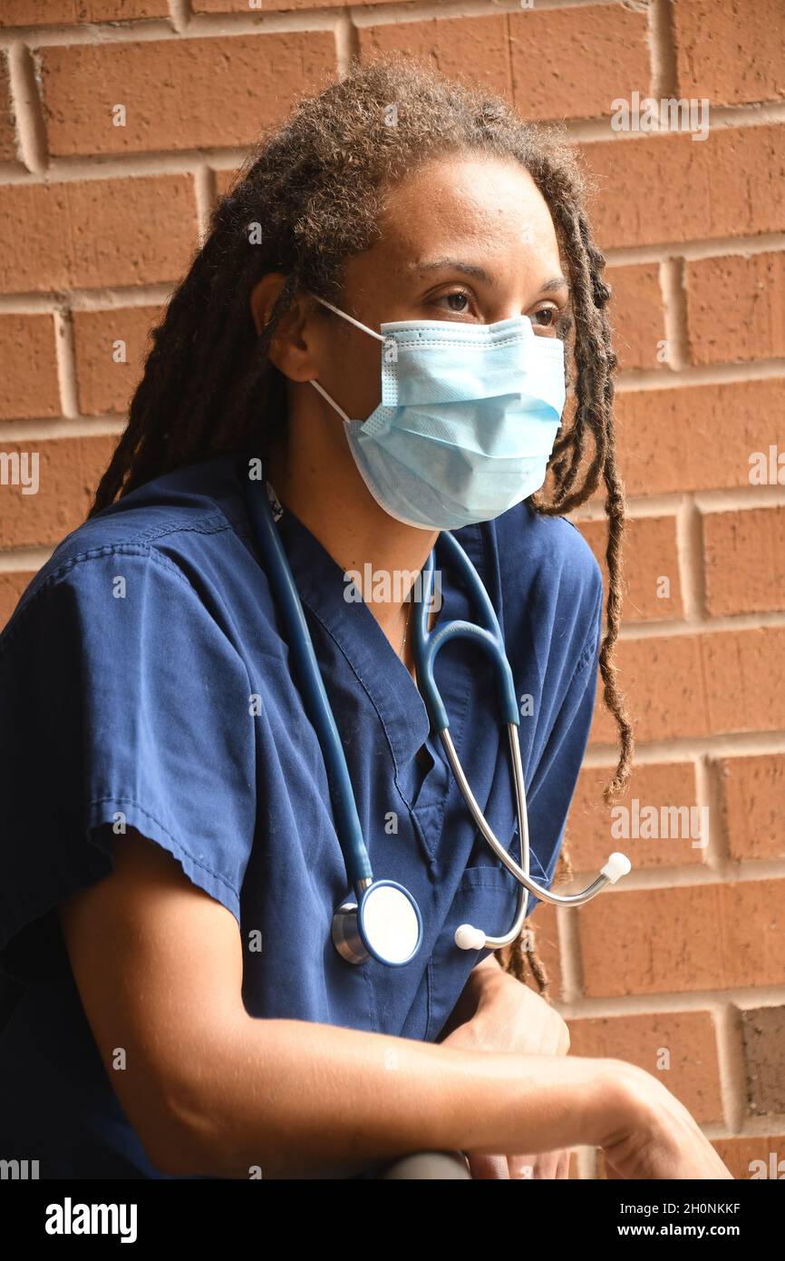 Female doctor with long dreads Stock Photo - Alamy