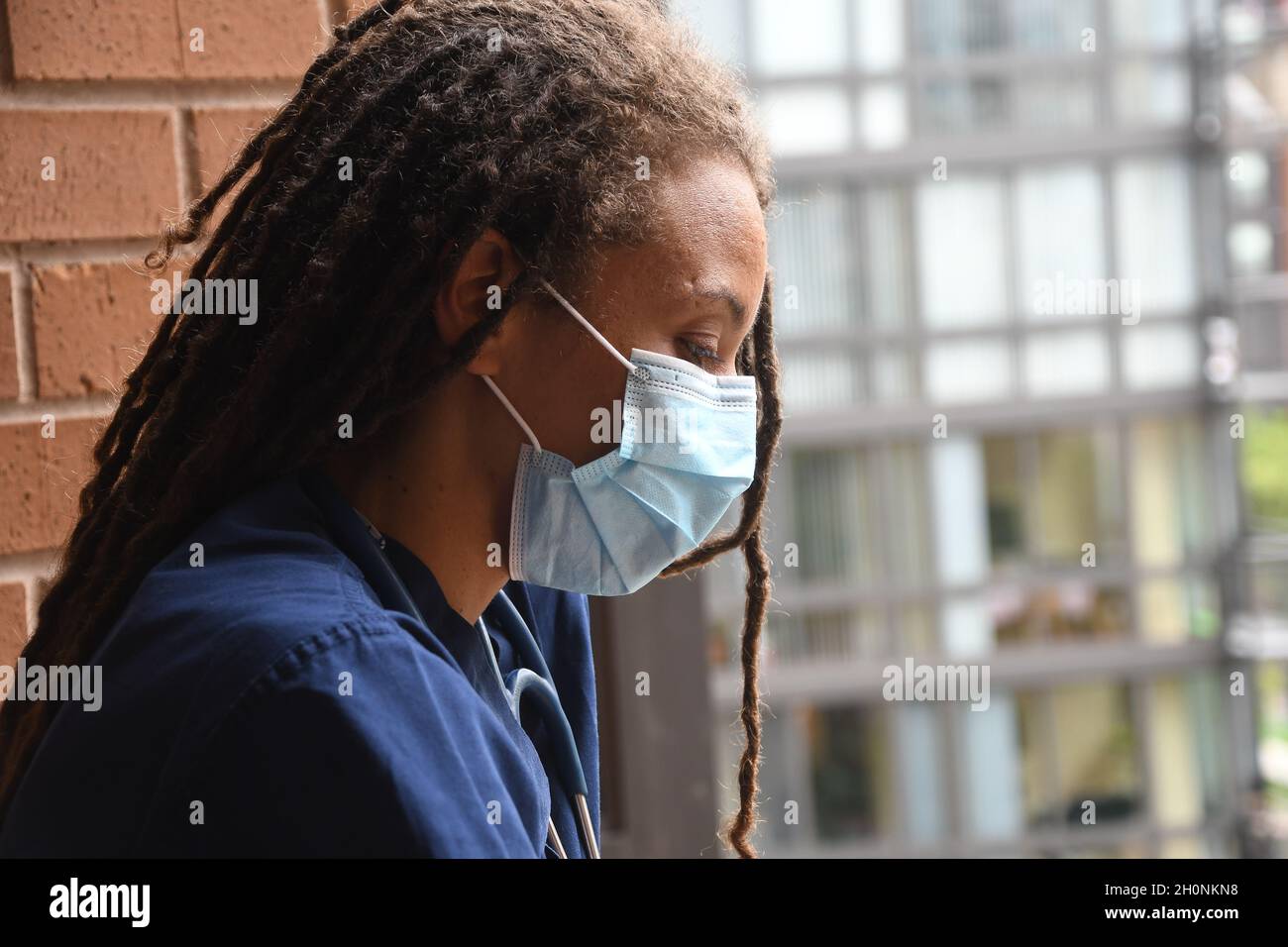 Female doctor with long dreads Stock Photo - Alamy