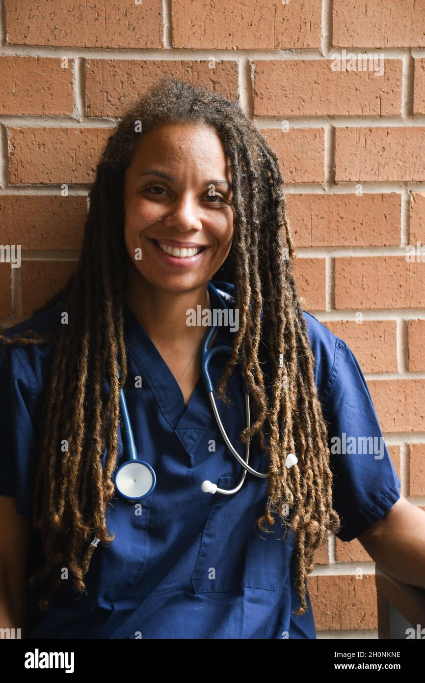 Female doctor with long dreads Stock Photo - Alamy
