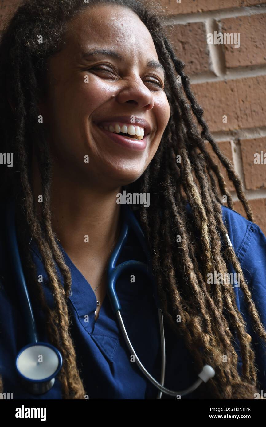 Female doctor with long dreads Stock Photo - Alamy