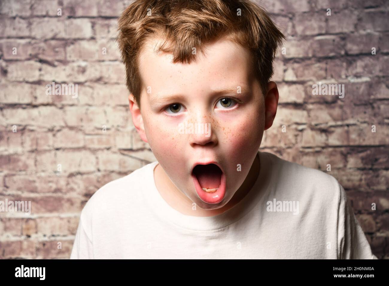 Dramatic white boy Stock Photo - Alamy