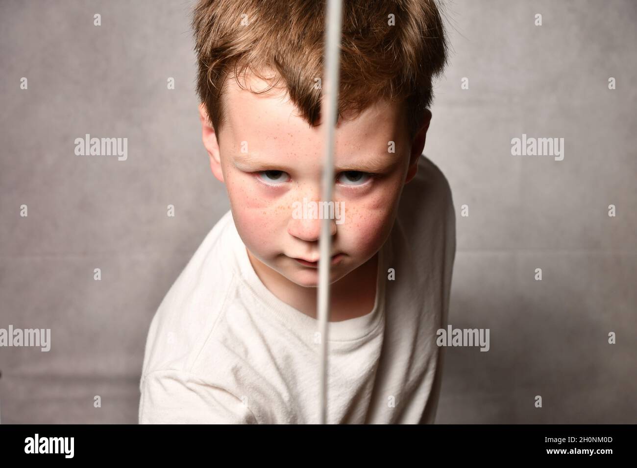 Dramatic white boy Stock Photo - Alamy