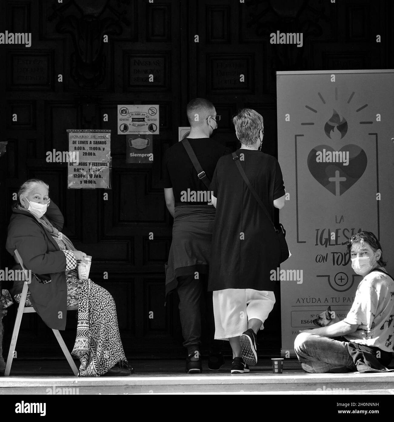 Granada, Spain; October-11, 2021: Two beggars asking for money at the ...