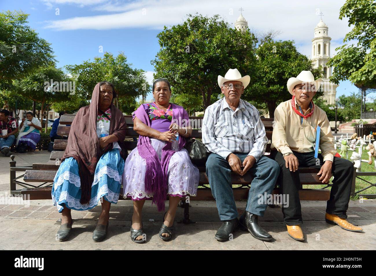 Man, Woman. Yaqui indigenous community in Plaza Zaragoza and Palacio de ...