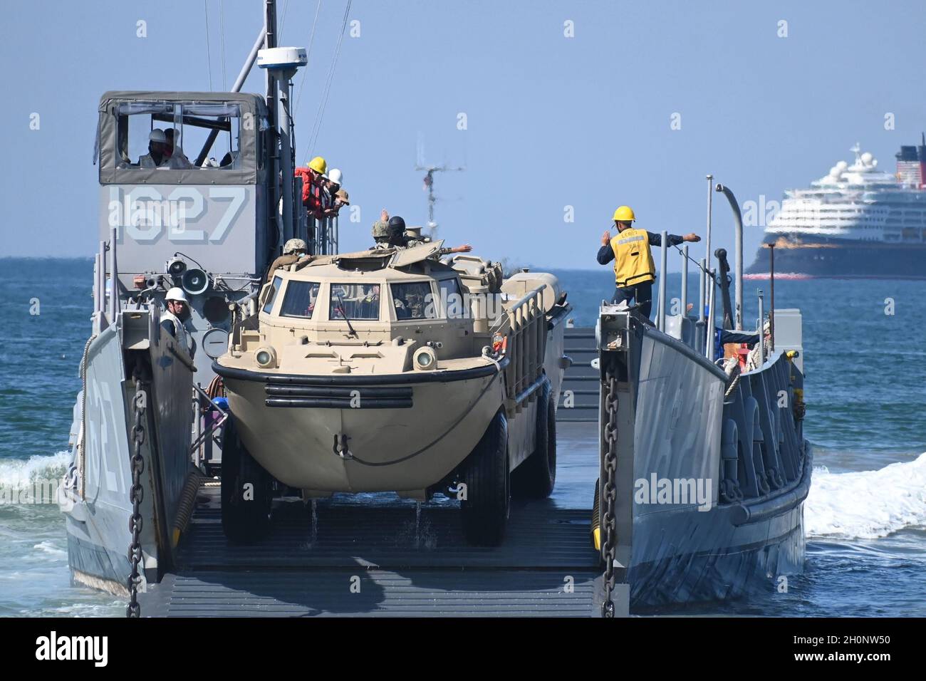 A conventional team loads a lighter amphibious resupply cargo – 5 ton ...