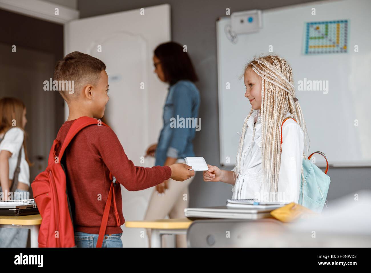 Backpacks classroom table hi-res stock photography and images - Alamy