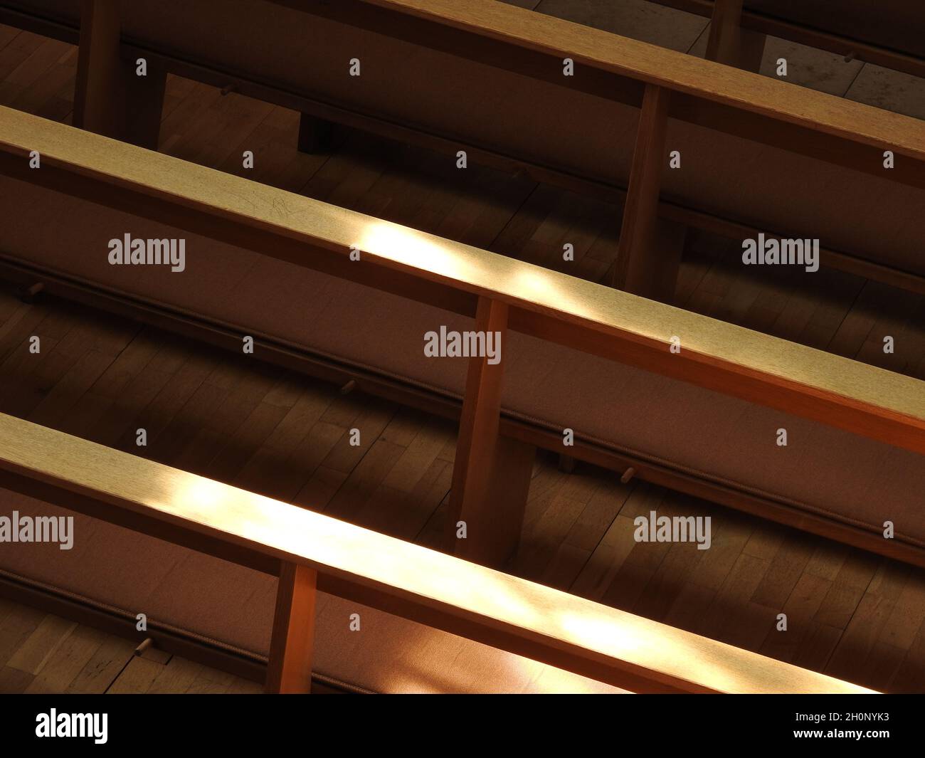 High angle shot of church pews with a sunlight Stock Photo - Alamy