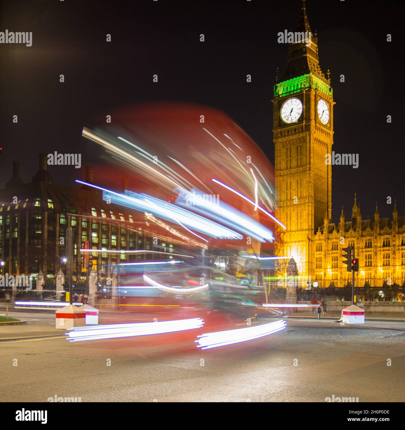 Beautiful shot of Big Ben at night with street lights in London Stock ...