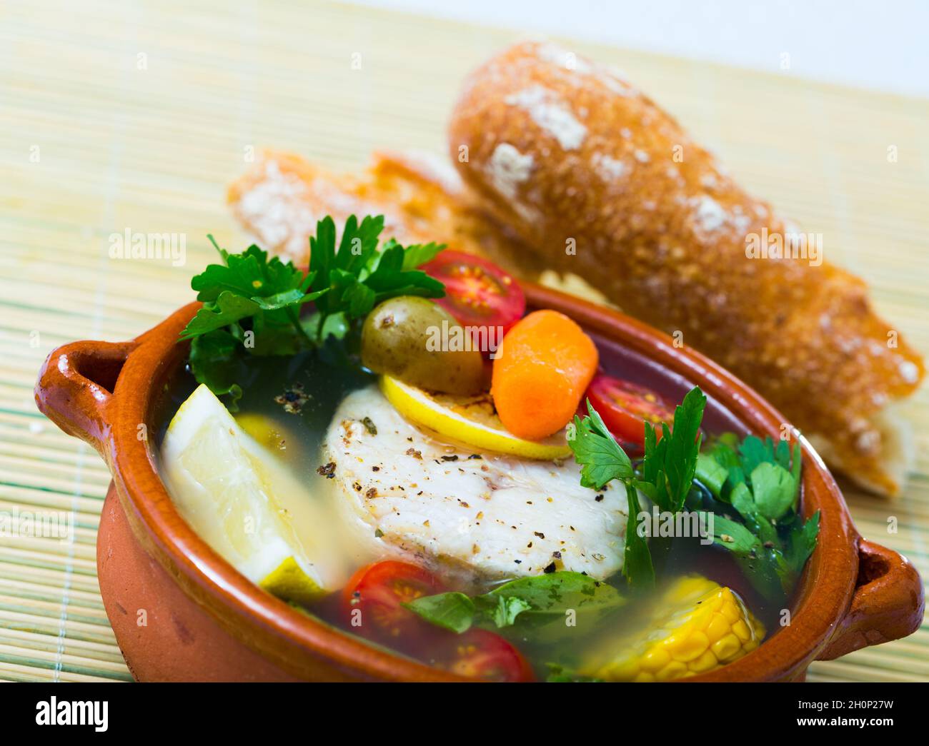 Fisherman's hoosh cooked with alaska pollock, corn and lemon Stock ...