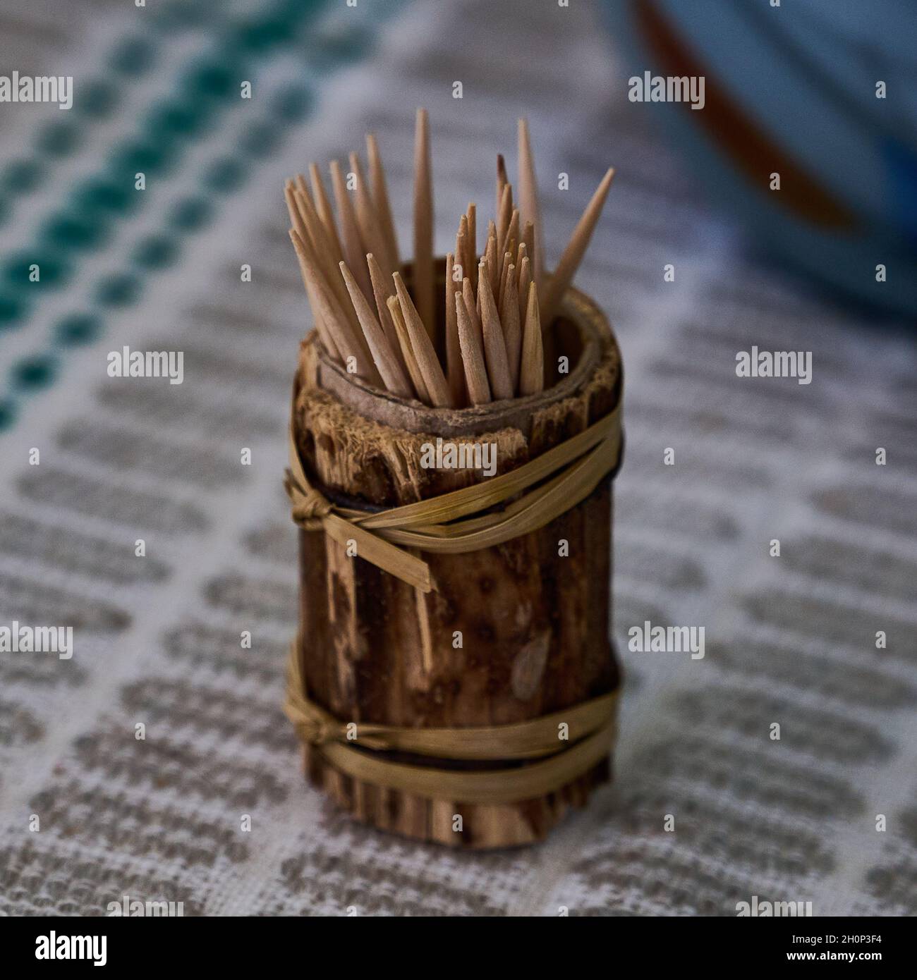 a jar with wooden toothpicks is on the table close-up photo Stock Photo ...