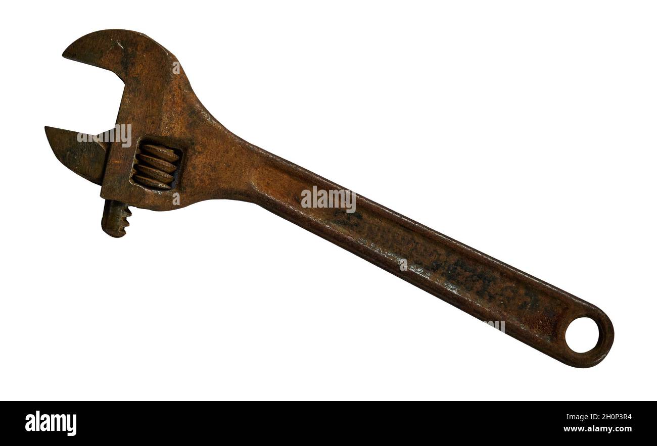 old rusty adjustable wrench lie on a white background close-up Stock ...
