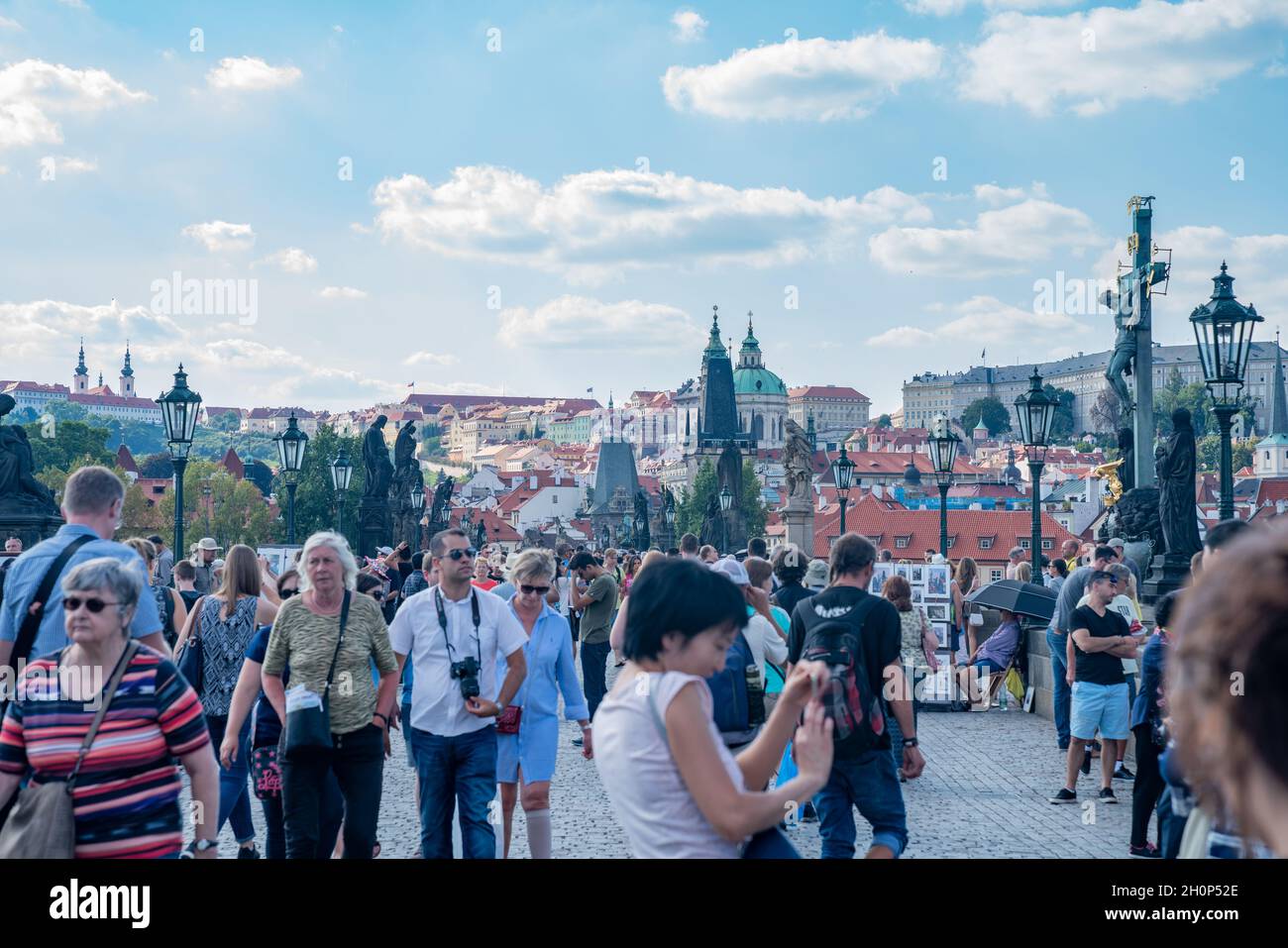 Vltava River view with city buildings and bridge in scenic image in ...