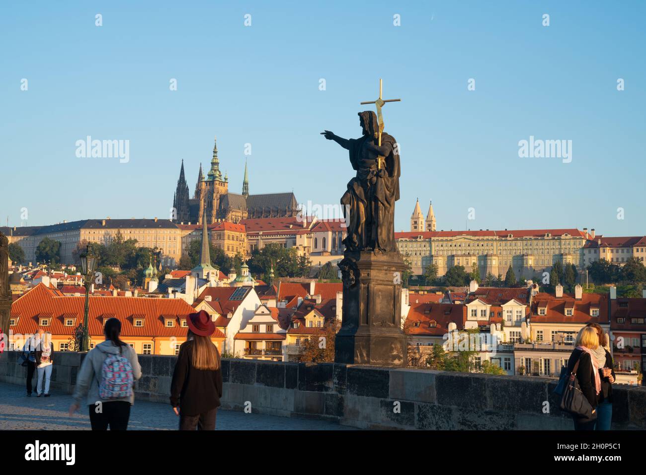 Prague, Czech Republic - August 29 2017; people and historic statues at ...
