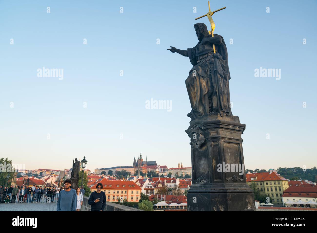 Prague, Czech Republic - August 29 2017;Statue of Jesus holding gold ...