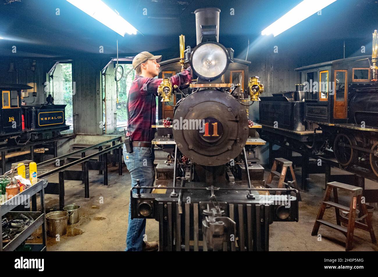 United States. 18th July, 2021. A staff member maintains a locomotive ...