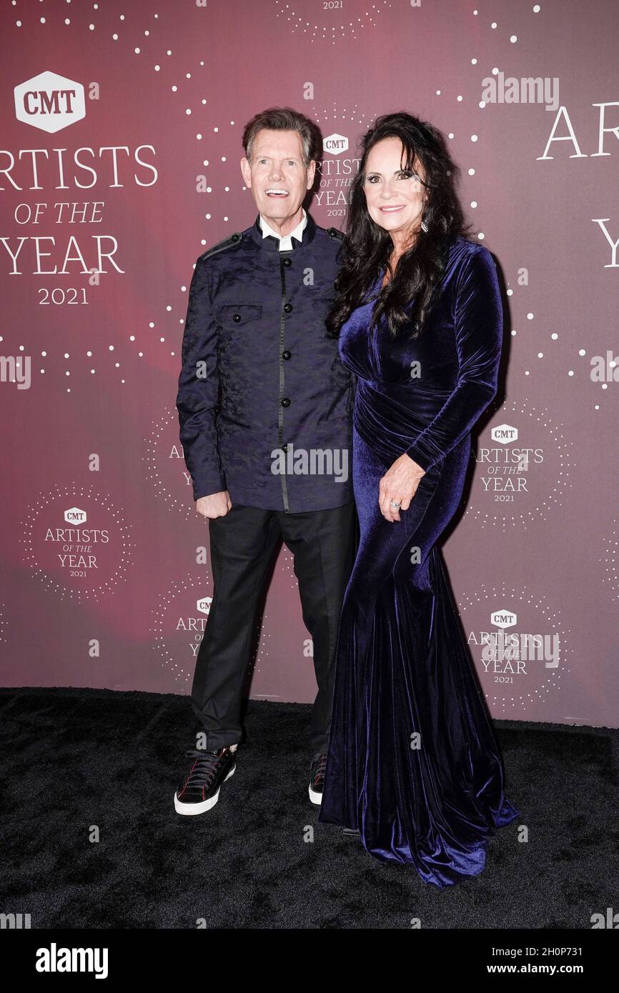 Randy Travis, Mary Davis attends the 2021 CMT Artist of the Year on ...