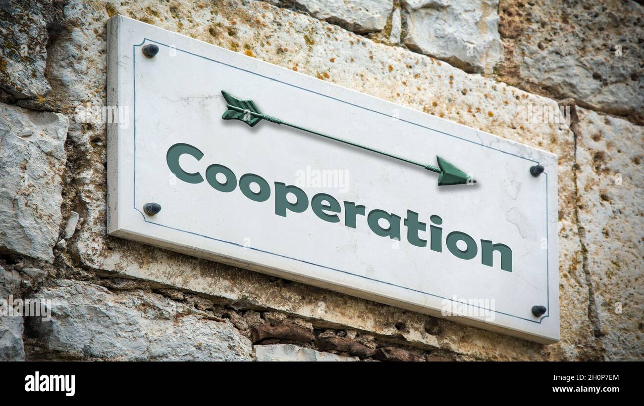 Street Sign the Direction Way to Cooperation Stock Photo - Alamy
