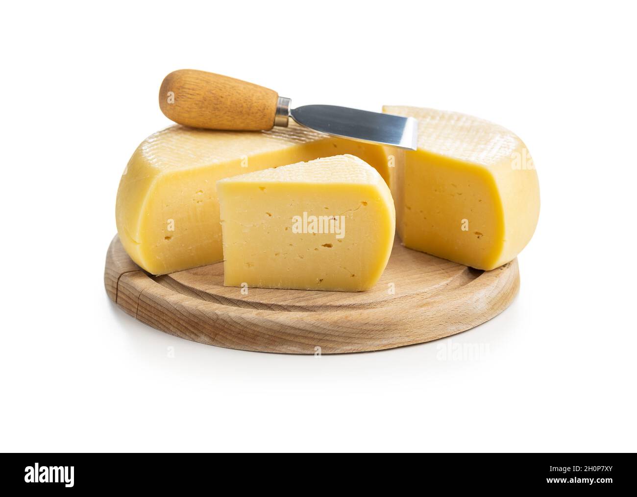 Block of hard cheese isolated on white background Stock Photo - Alamy