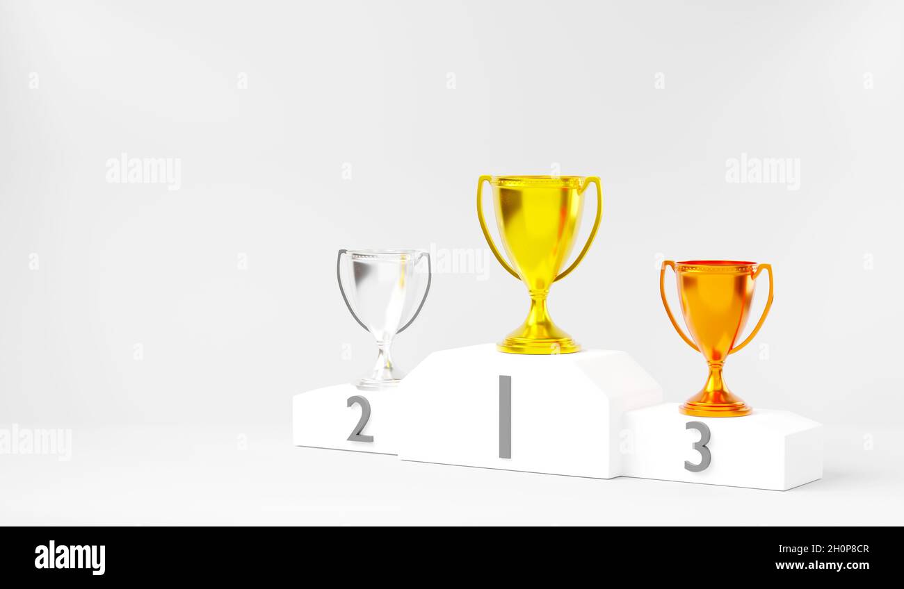 White winner podium, gold, silver and bronze trophy cup on prize podium ...