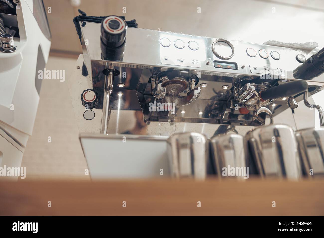 Professional modern coffee machine on counter in cafeteria Stock Photo ...