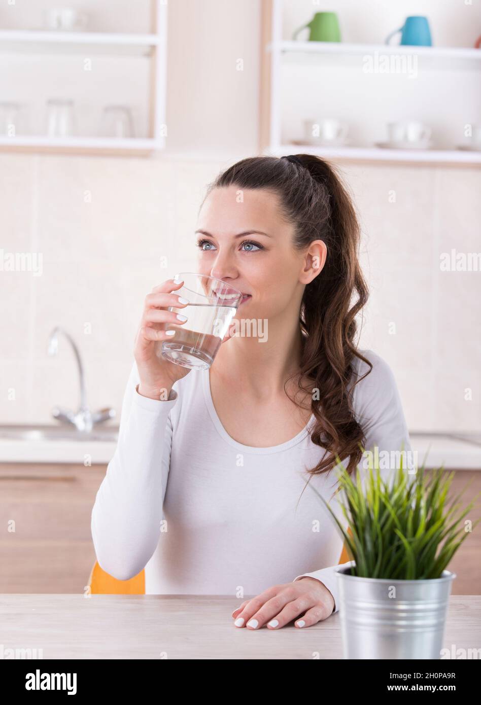 Woman Drinking Water Kitchen