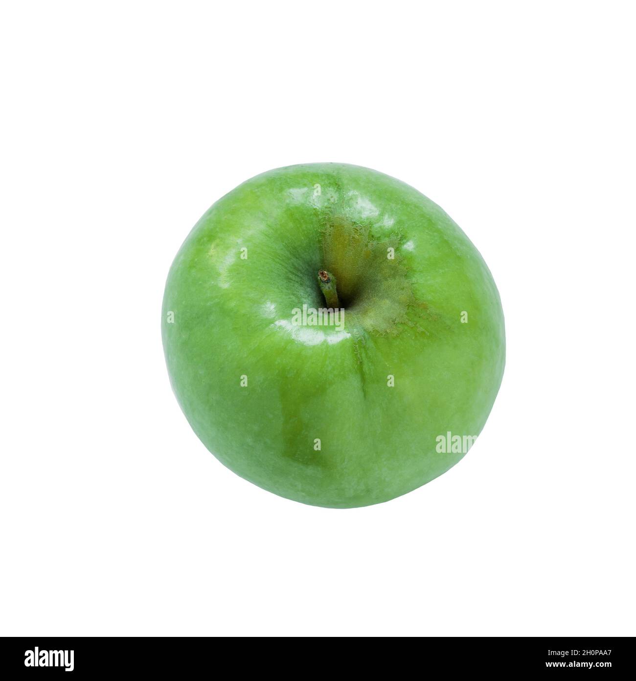 A ripe green apple isolated on a white background. Side view from above ...