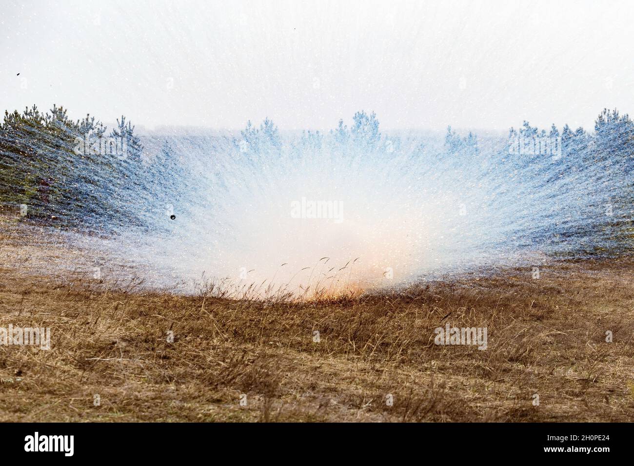 The explosion of a thrown grenade during the field phase of the ...