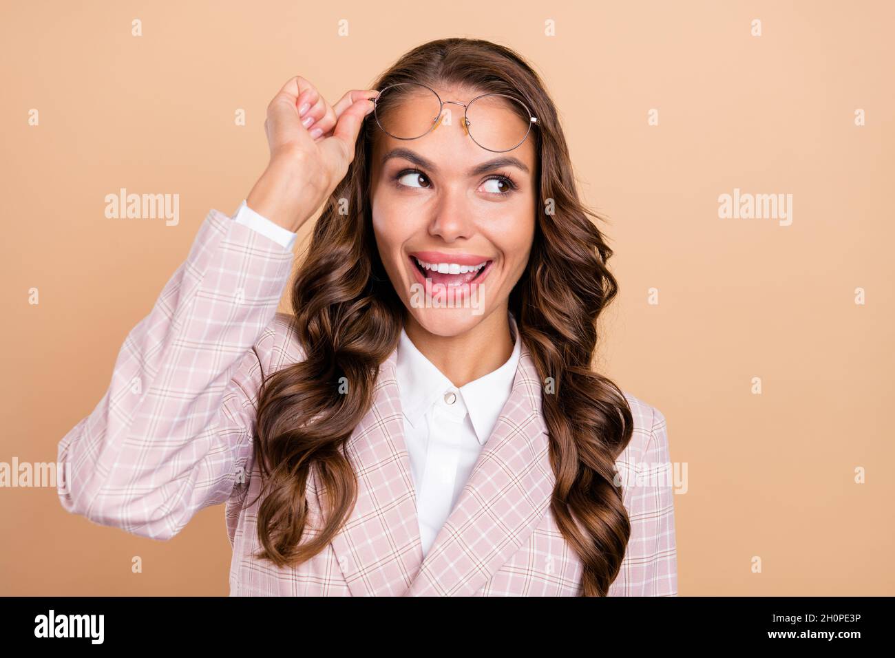 Photo of astonished satisfied girl hand touch hold spectacles look ...