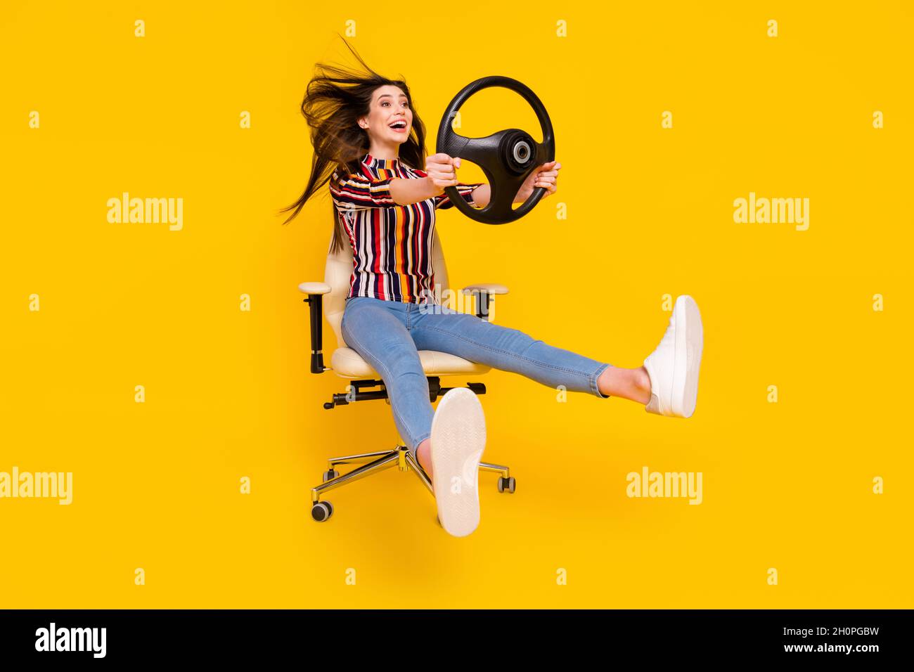 Full length body size photo girl sitting keeping steering wheel crazy ...