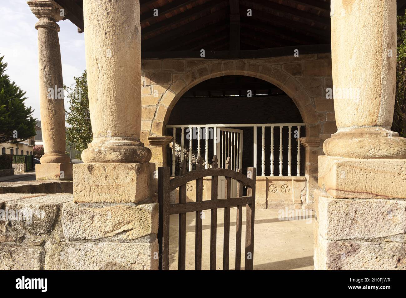 Ancient building with columns and metal gate Stock Photo - Alamy
