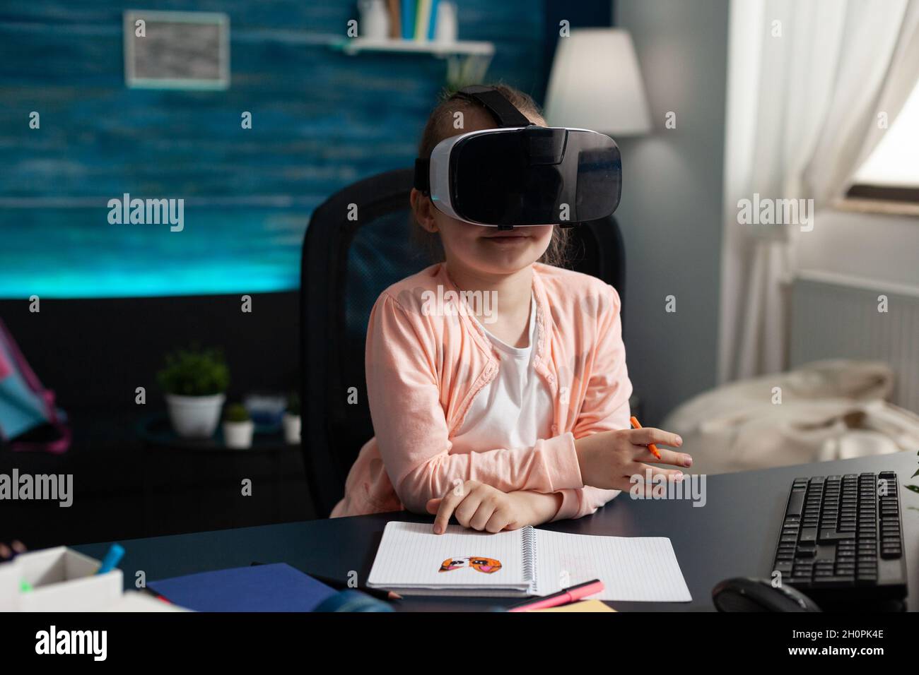 Children experiencing virtual reality using headset while sitting at ...