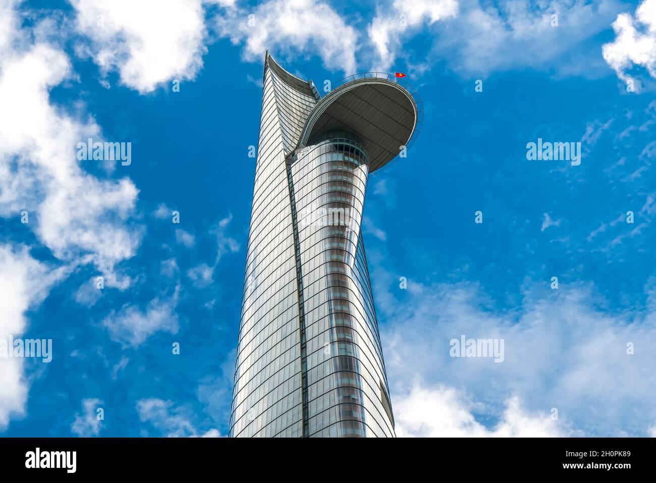 Helipad on the roof of financial tower surrounded by glass is ...