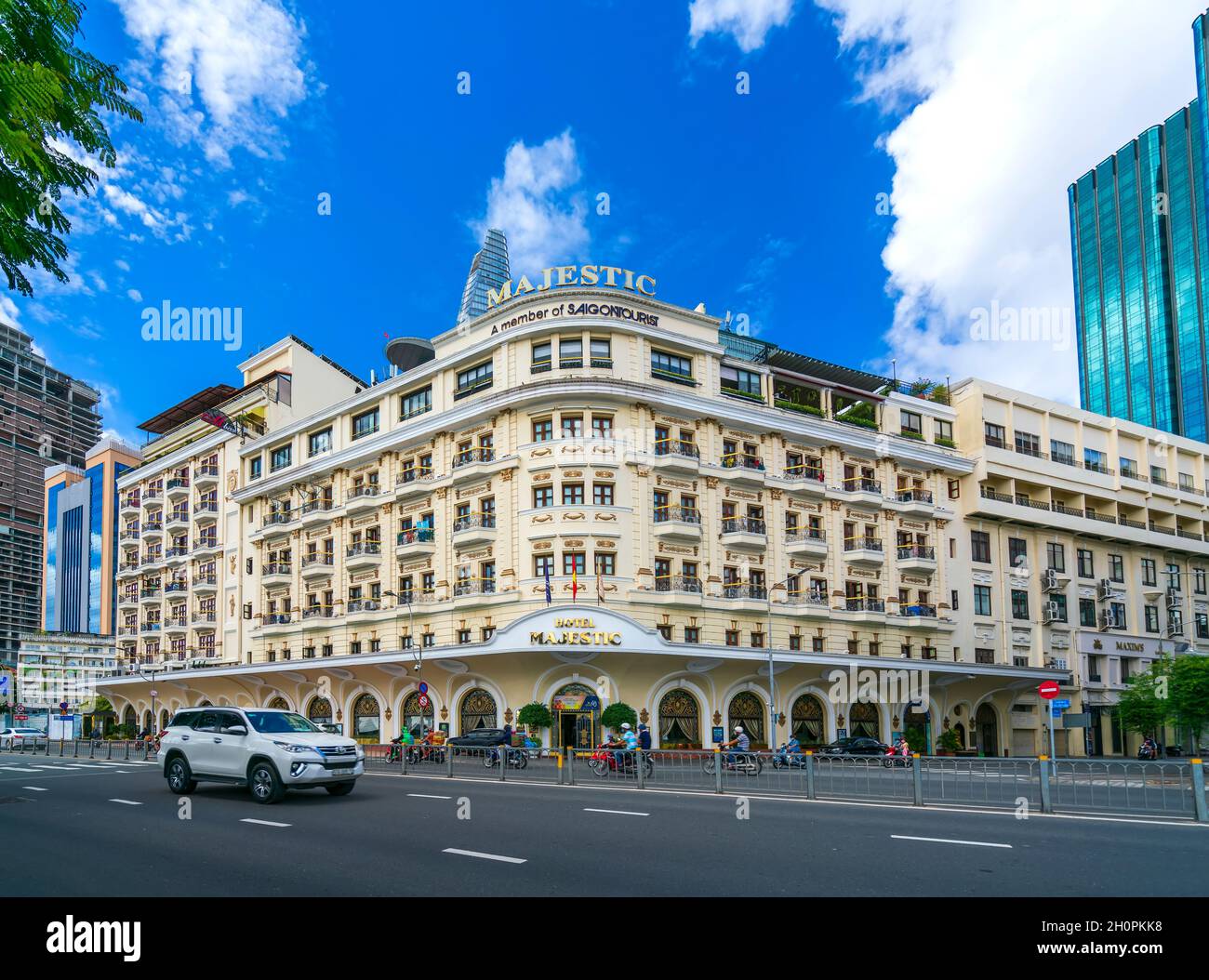 Palace royal along a busy boulevard with French architectural style ...