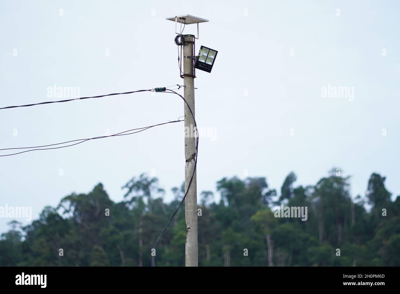 A solar sport light was installed on a pole to light the coverage area ...