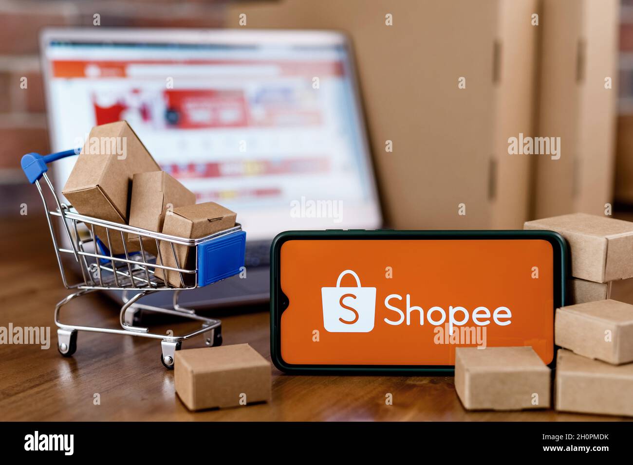 Shopee is e-commerce technology company. Smartphone with Shopee logo on ...