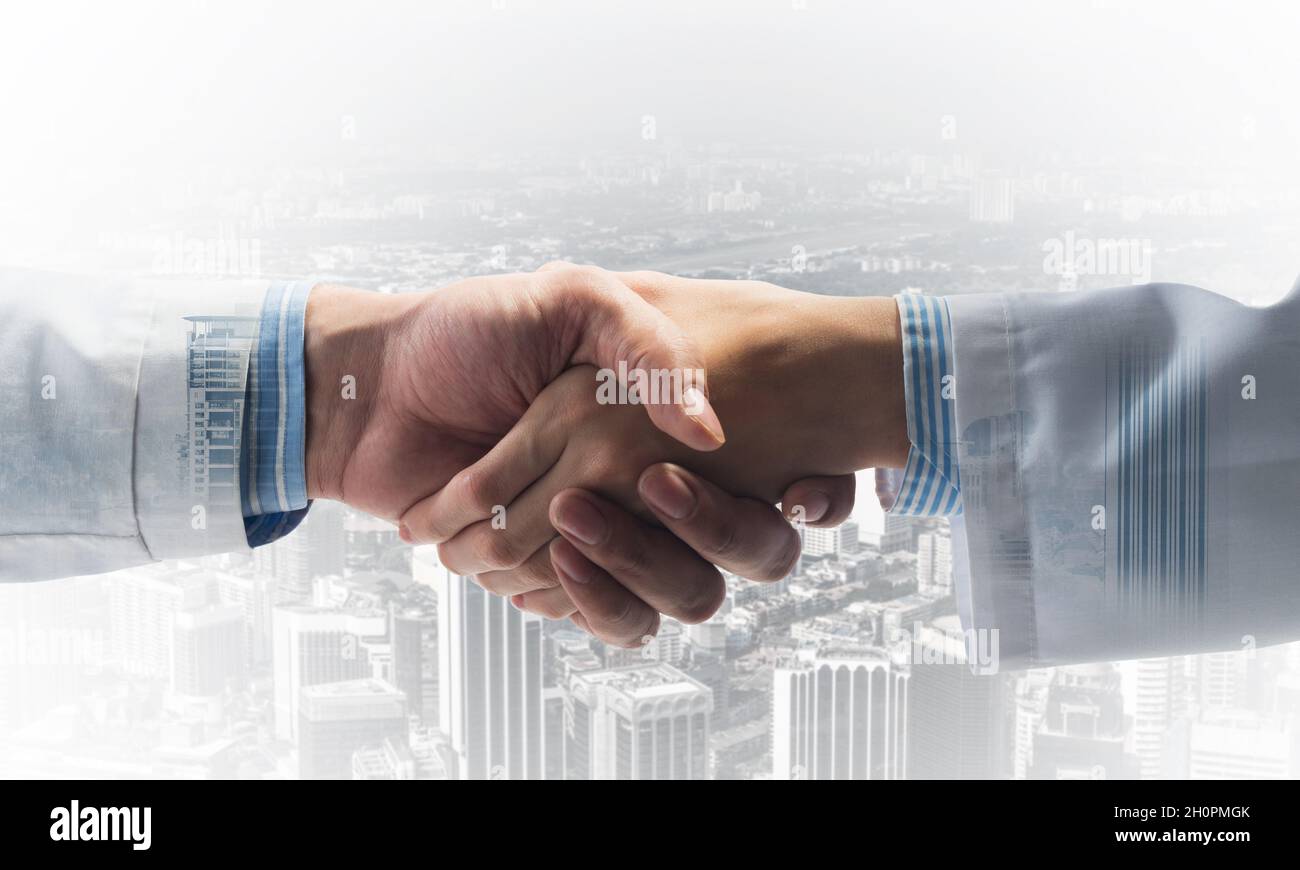 Handshake between nurse doctor hi-res stock photography and images - Alamy