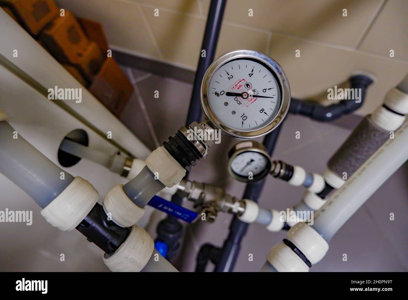 pressure gauge on the water supply pipe Stock Photo - Alamy