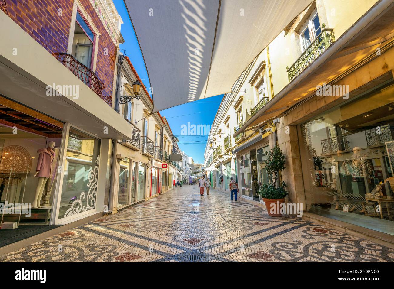 Main commercial promenade in the old town of Faro, capital city of ...