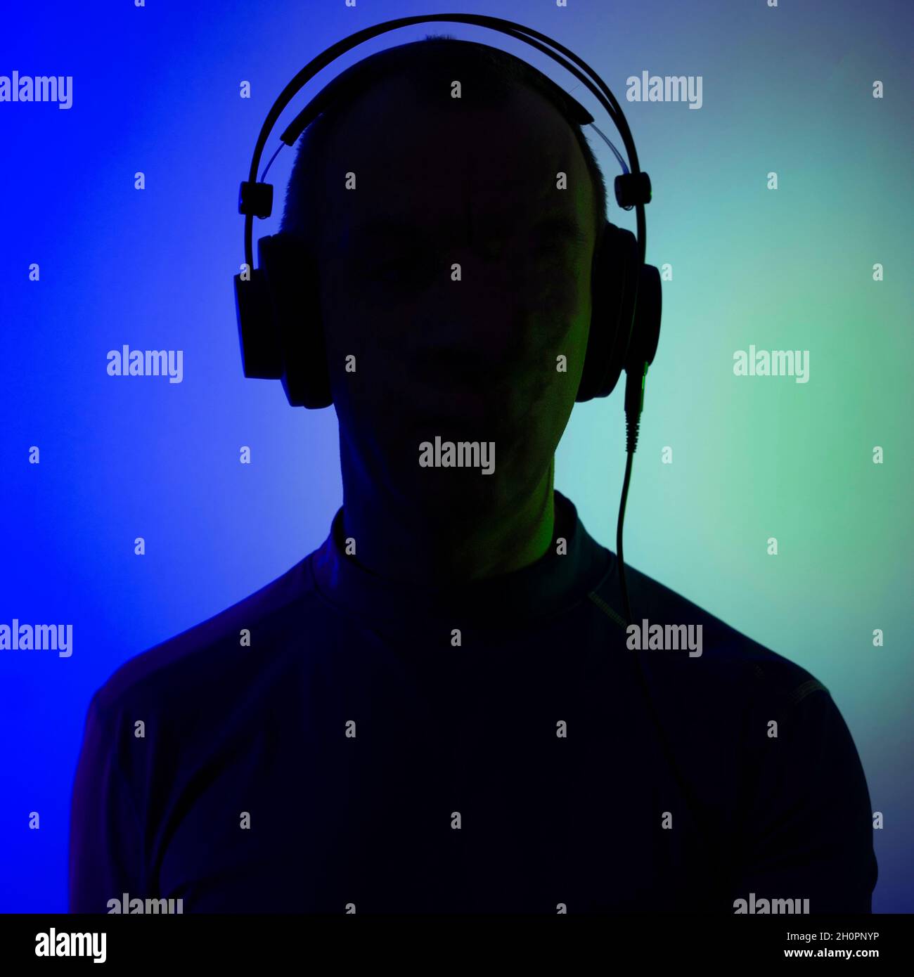 Dj deejay electronic wearing music headphones with coloured lights ...