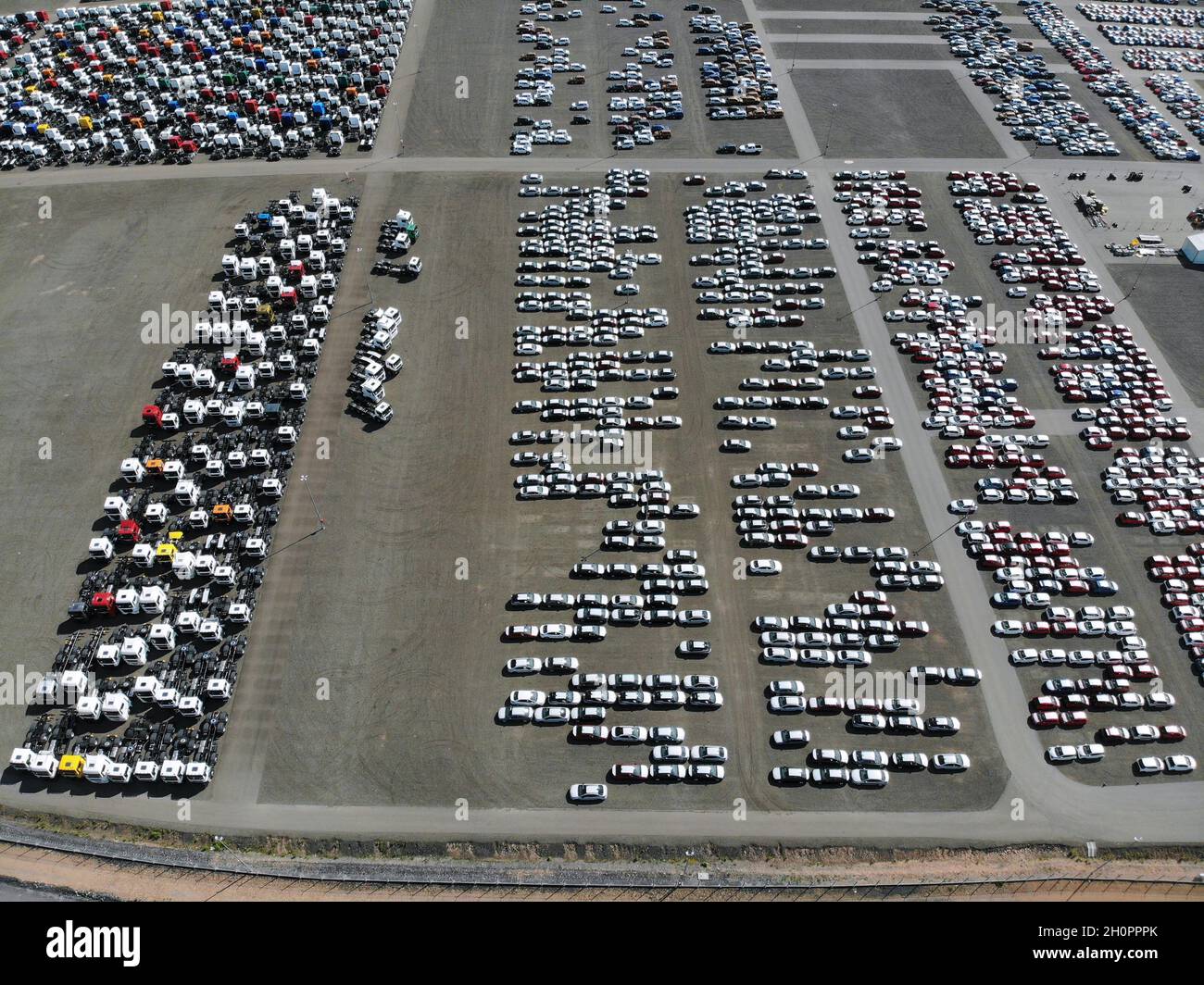 Car factory parking lot. New car logistics center Stock Photo - Alamy