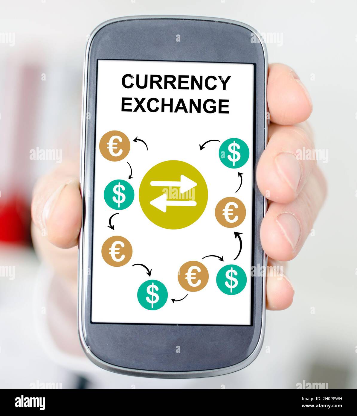 Hand holding a smartphone with currency exchange concept Stock Photo ...