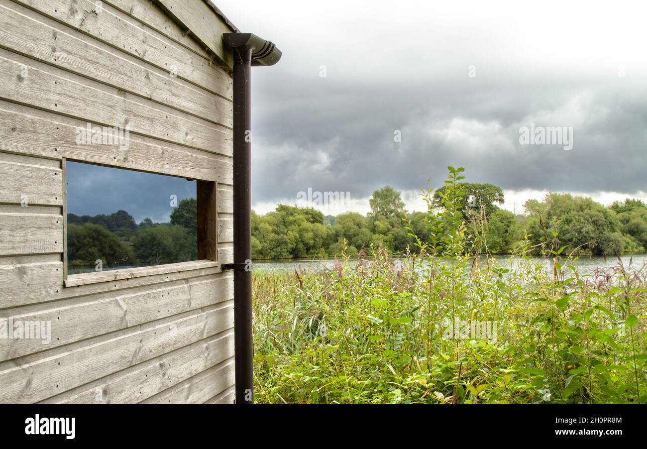 Window Of A Wooden Bird Hide Overlooking A Reedbed and Lake, Blashford ...