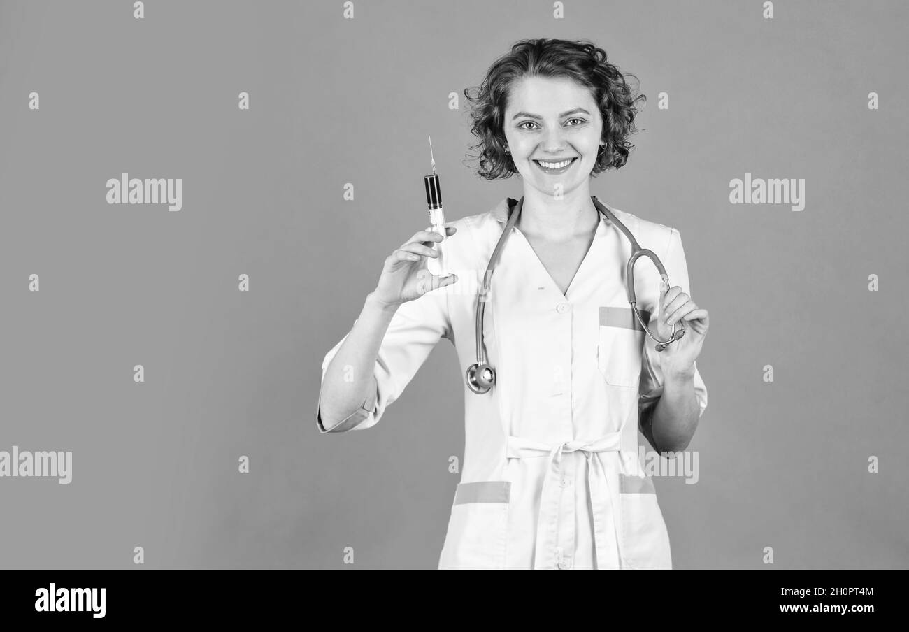 Doctor use syringe with needle vaccination for baby. medicine vial dose ...