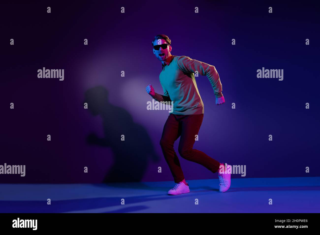 Full body photo of funky happy young positive man good mood dance ...