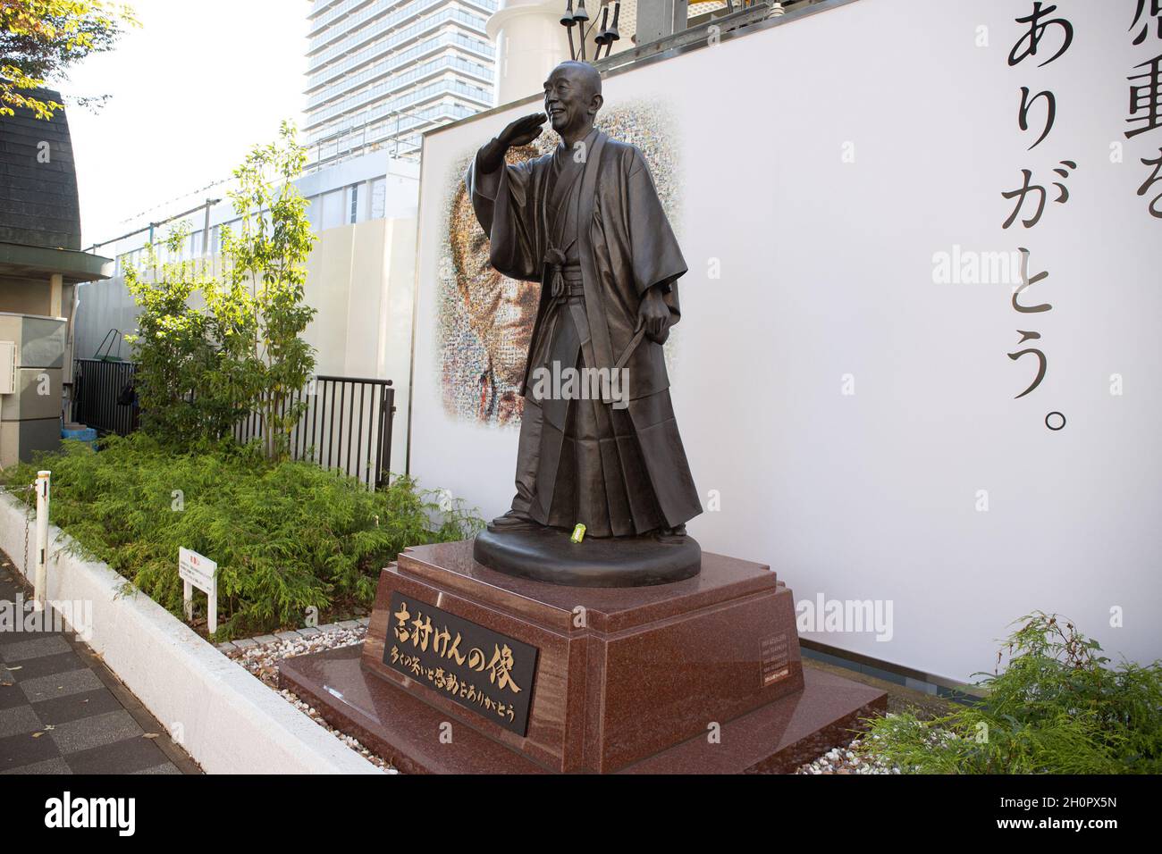 A bronze statue of the late Japanese comedian Ken Shimura in Tokyo ...