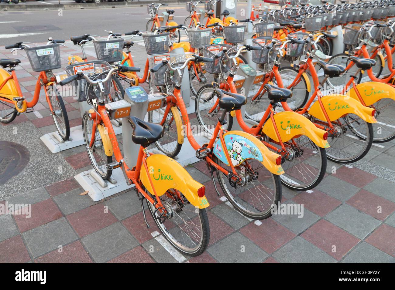 TAIPEI, TAIWAN - DECEMBER 3, 2018: City bicycle sharing station in Taipei, Taiwan. The bike ...